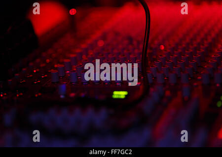 Sound control panel in the color light Stock Photo - Alamy