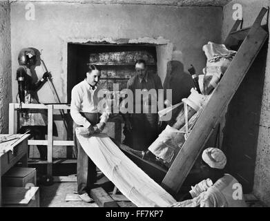 HOWARD CARTER (1873-1939). /nEnglish archaeologist. In the tomb of King ...