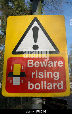 Beware of Bollards warning sign Stock Photo - Alamy