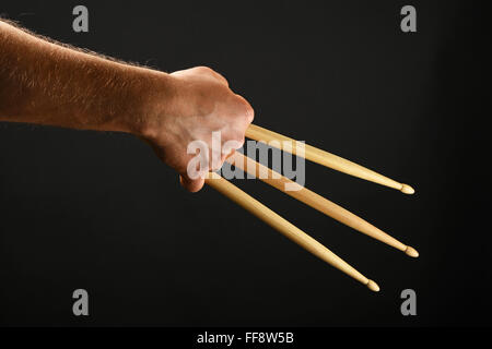 Famous wolverine claws heroic gesture, man hand holding three wooden ...
