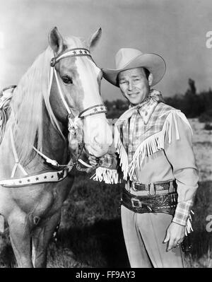 ROY ROGERS American singing cowboy with his horse Trigger Stock Photo ...