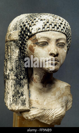 Painted limestone bust of the Ancient Egyptian queen Nefertiti. This ...