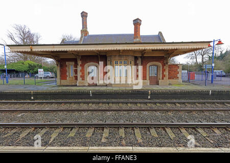 Red brick with Sandstone built Railway Station alongside the tracks ...