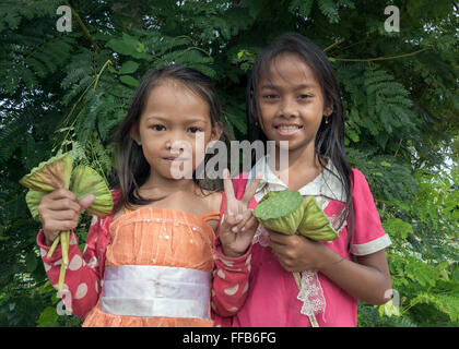 Cambodia children - two young children selling goods to tourists ...