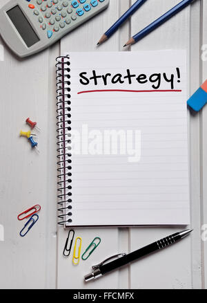 Strategy word on wooden table Stock Photo - Alamy