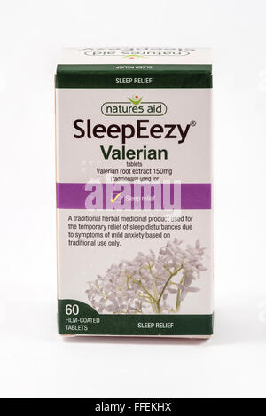 Valerian and pills Stock Photo - Alamy