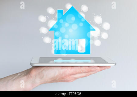 home with smart phone Stock Photo - Alamy