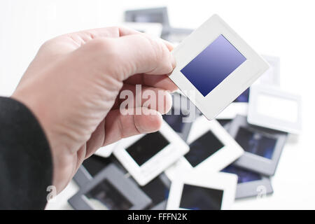 Frame in the hand with diapositive in background Stock Photo - Alamy