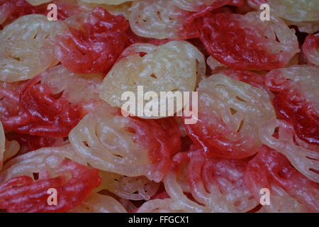 Pile of Mshabak or Mushabbak deep fried dough soaked in sweet syrup for ...