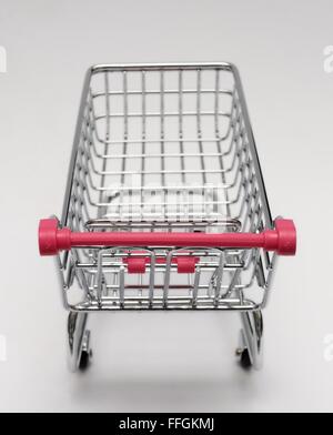Small supermarket shopping trolley Stock Photo - Alamy