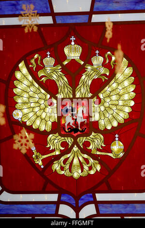 The flag and coat of arms of the Russian Federation on the ...