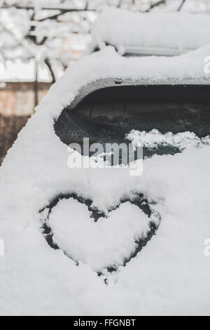 Heart shape on car window Stock Photo - Alamy