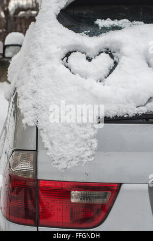 Heart shape on car window Stock Photo - Alamy