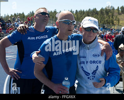 An Air Force Senior Master Sgt. opens the door of Air Force One before ...