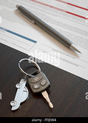 Car loan application with car keys Stock Photo - Alamy