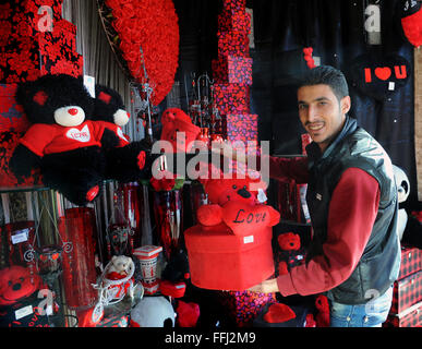 Syrian man with teddy bear Stock Photo - Alamy