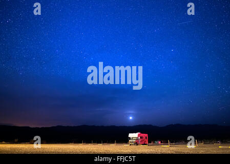 Stars in sky over desert Stock Photo - Alamy