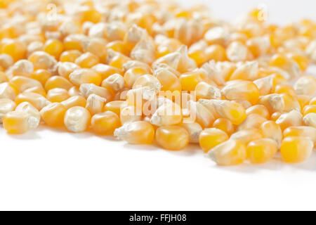 Unpopped and popped pop corn Stock Photo - Alamy