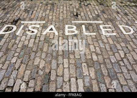 Disabled parking bay markings on roadway Stock Photo - Alamy