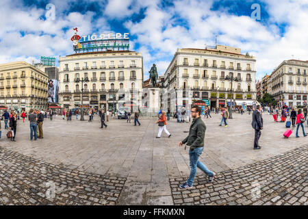 Wide view of Puerta del Sol in Madrid with large advertising billboard ...