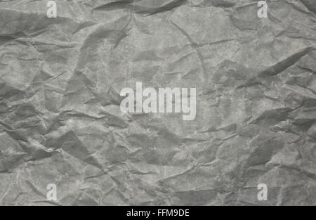 Creased parchment paper background texture with dark burned effect ...