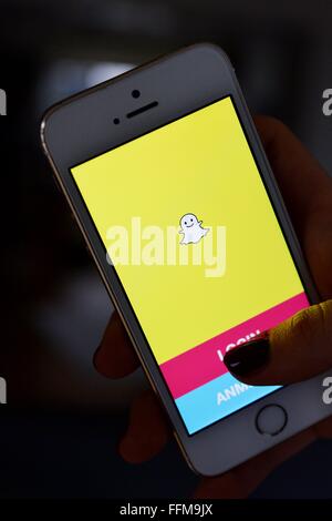 The logo of the App snapshot is on the display of an iPhone, Germany ...