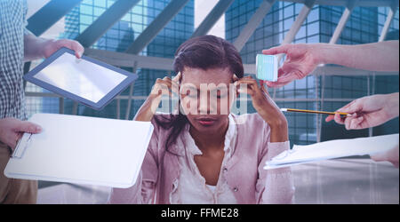 Composite image of businesswoman stressed out at work Stock Photo - Alamy