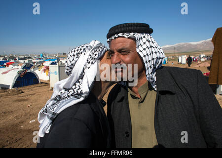 refugee men in Arbat refugee camp in Northern Iraq Stock Photo - Alamy