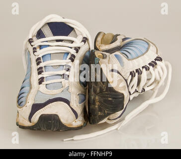 Worn out tennis shoes Stock Photo - Alamy