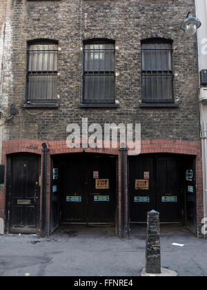 An old warehouse building in Soho, decorated with graffiti and ...