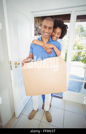 man holding an empty cardboard box, empty box. hands holding an empty ...