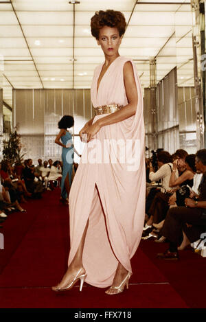 WOMEN'S FASHION, 1981. /nA model wearing styles from the Halston spring ...
