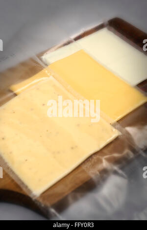 packed cheese slices Stock Photo - Alamy