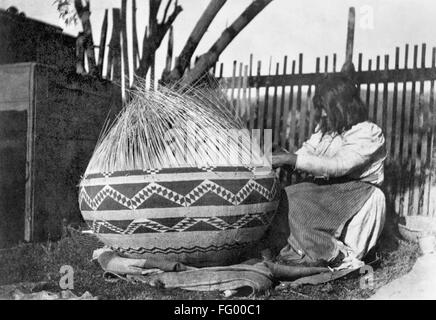 Native American Indian woman weaving baskets Stock Photo - Alamy