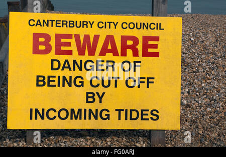 Warning sign for incoming tides Stock Photo - Alamy