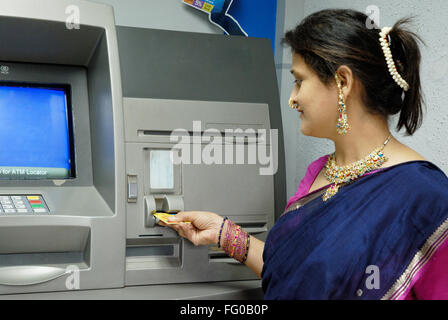 ATM machine withdraw money indoor Stock Photo - Alamy