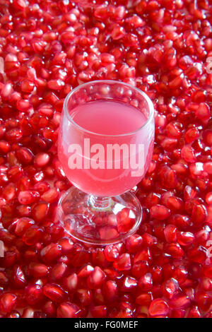 Fruit and drink, Pomegranate Anardana seeds with glass of pulp good for ...