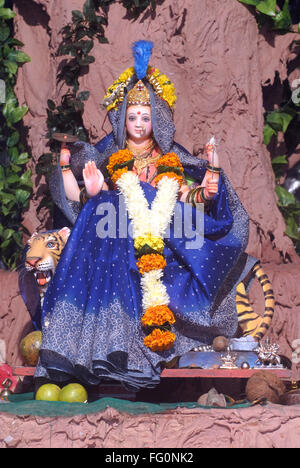 Durga Hindu Goddess Riding Tiger Stock Photo - Alamy