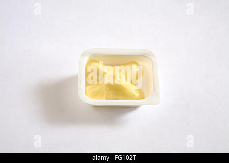 Dairy product , makhan maska butter in container on white background ...