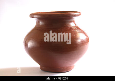 Concept , ghada clay or earthen pot crock pail pitcher on white ...