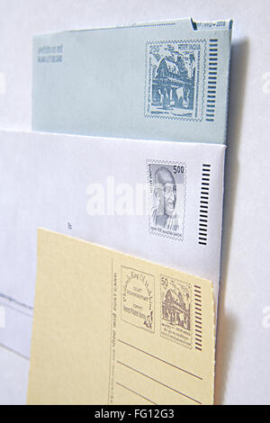 inland letter card stamped envelope and postcard on white backgrounds ...