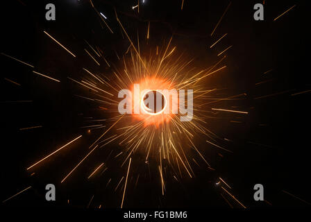 Fire cracker burning Stock Photo - Alamy