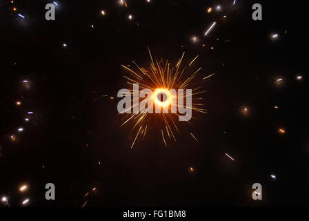 Fire cracker burning Stock Photo - Alamy