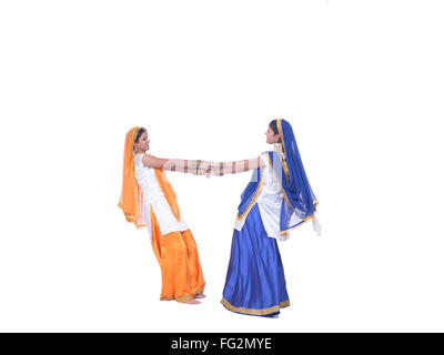 Two Bhangra Dancers performing a dance step with hand gestures Stock ...