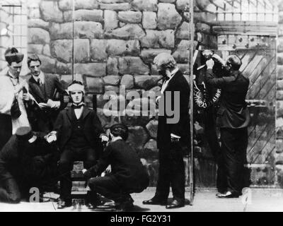 Execution by electric chair, Sing Sing Prison, New York, USA. Strapping ...