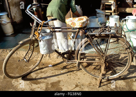 Bicycle used to carry aluminium milk can in Mahesh Dairy Doodh Kendra ...