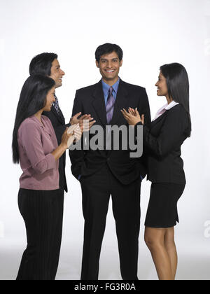 Confident stylish young man clapping hands applauding for endorsement ...