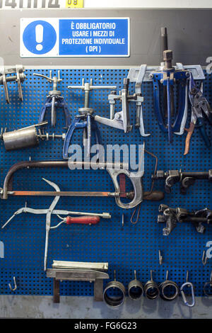 Tools from mechanical workshop and safety signs Stock Photo - Alamy