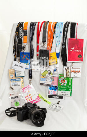 Press passes on lanyards for access to events for accredited ...