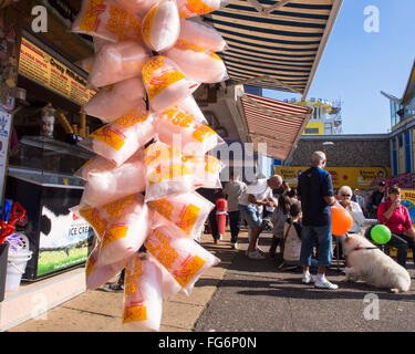 candy floss in bags hanging from a stall at a fairground Stock Photo ...